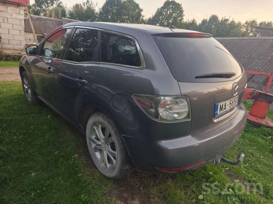 Grey Mazda CX-7 2009 in Riga, with an engine capacity of 2.20 L and mileage of 212 thousand km for 3900 €, photo 5 on AUTOMOTO.COM.LV