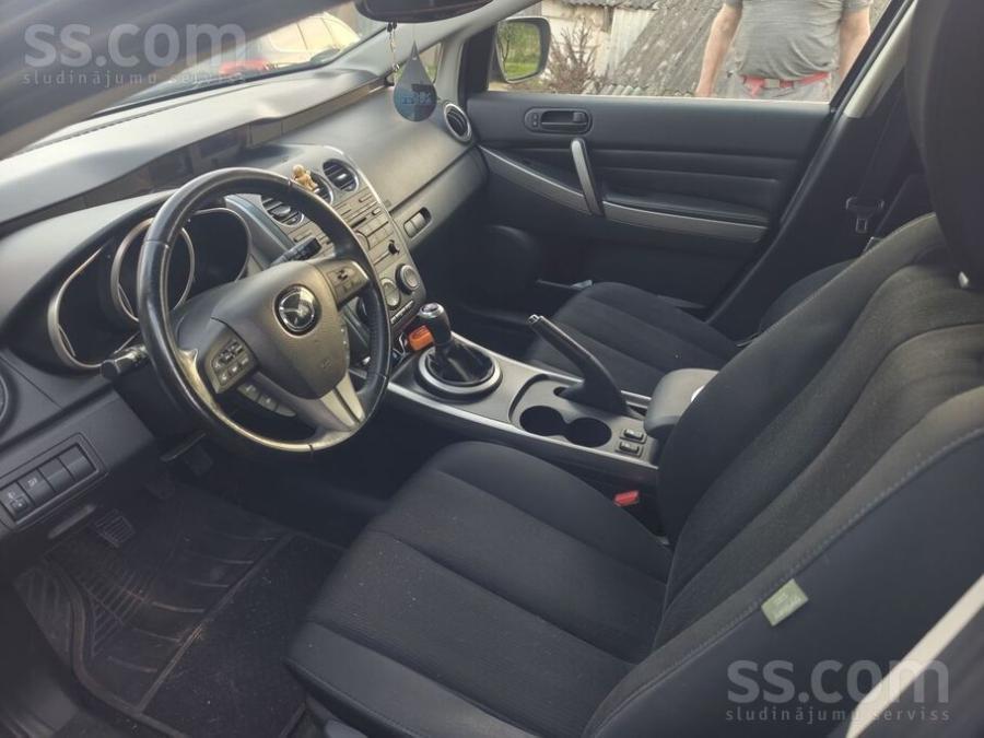 Grey Mazda CX-7 2009 in Riga, with an engine capacity of 2.20 L and mileage of 212 thousand km for 3900 €, photo 6 on AUTOMOTO.COM.LV