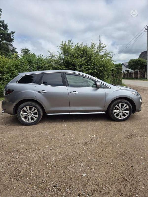 Grey Mazda CX-7 2010 in Vilnius, with an engine capacity of 2.18 L and mileage of 241 thousand km for 4100 €, photo 2 on AUTOMOTO.COM.LV