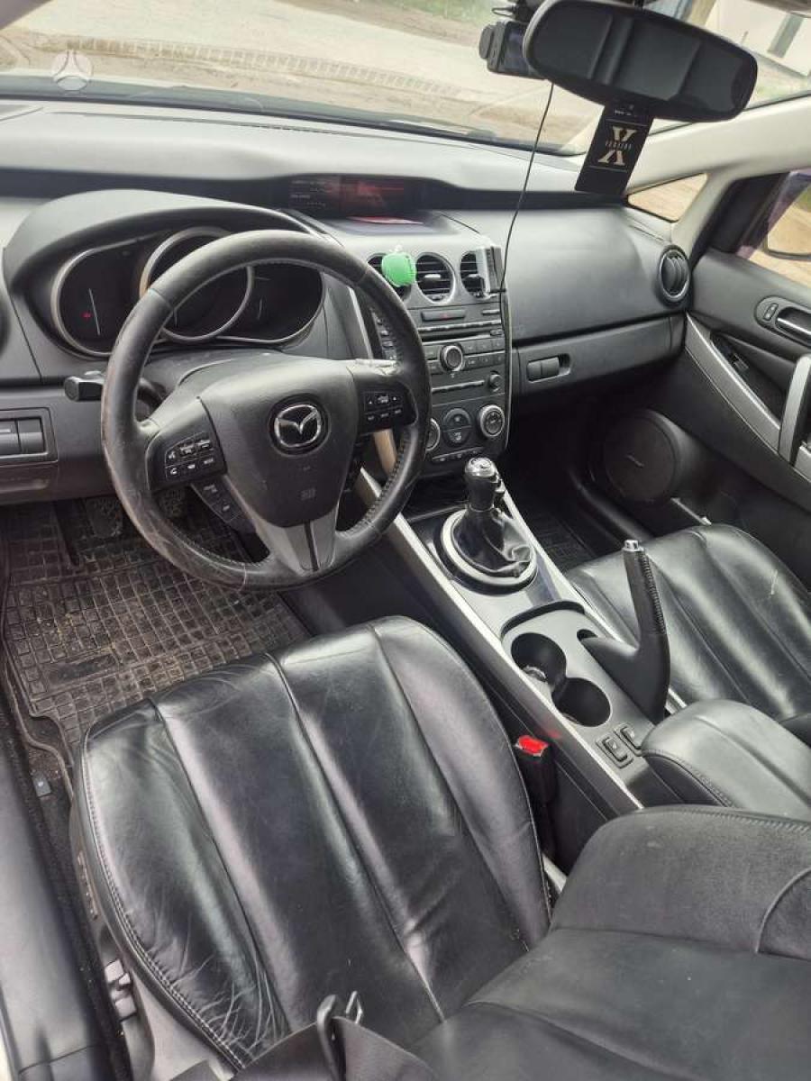 Grey Mazda CX-7 2010 in Vilnius, with an engine capacity of 2.18 L and mileage of 241 thousand km for 4100 €, photo 19 on AUTOMOTO.COM.LV