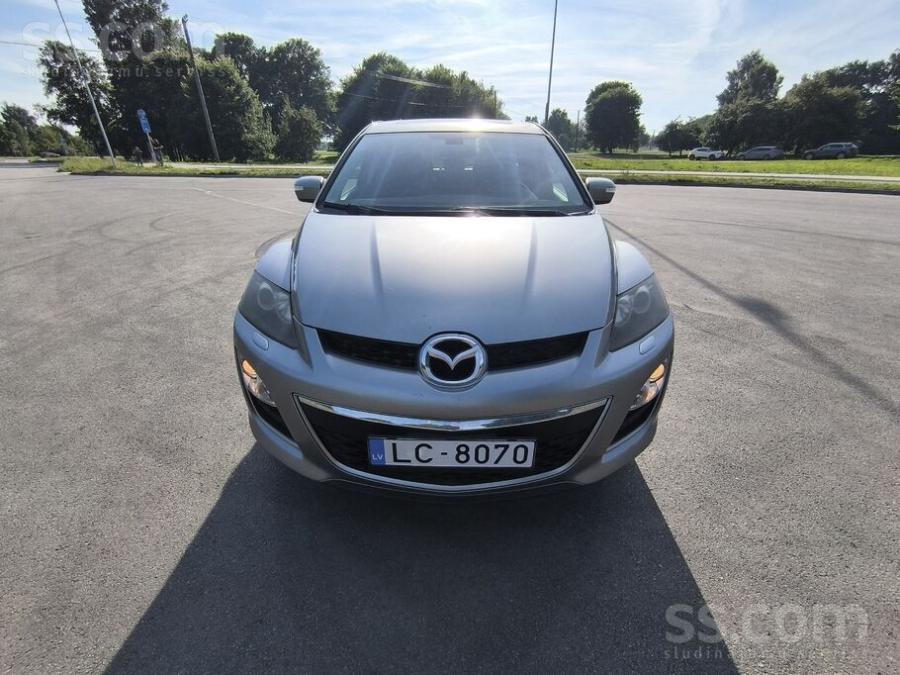 Grey Mazda CX-7 2010 in Riga, with an engine capacity of 2.20 L and mileage of 215 thousand km for 4500 €, photo 3 on AUTOMOTO.COM.LV