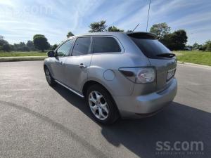 Grey Mazda CX-7 2010 in Riga, with an engine capacity of 2.20 L and mileage of 215 thousand km for 4500 €, photo 5 on AUTOMOTO.COM.LV