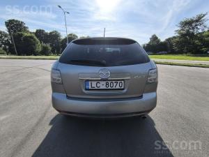 Grey Mazda CX-7 2010 in Riga, with an engine capacity of 2.20 L and mileage of 215 thousand km for 4500 €, photo 6 on AUTOMOTO.COM.LV