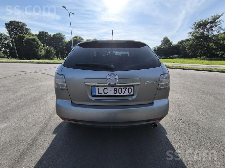 Grey Mazda CX-7 2010 in Riga, with an engine capacity of 2.20 L and mileage of 215 thousand km for 4500 €, photo 6 on AUTOMOTO.COM.LV