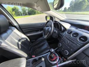 Grey Mazda CX-7 2010 in Riga, with an engine capacity of 2.20 L and mileage of 215 thousand km for 4500 €, photo 9 on AUTOMOTO.COM.LV