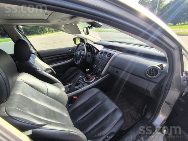 Grey Mazda CX-7 2010 in Riga, with an engine capacity of 2.20 L and mileage of 215 thousand km for 4500 €, photo 9 on AUTOMOTO.COM.LV