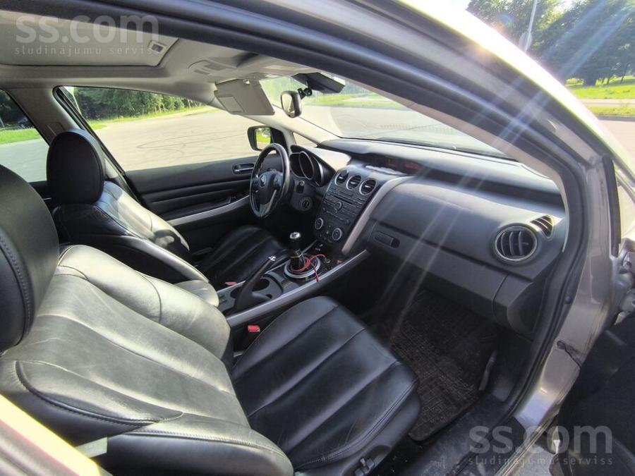 Grey Mazda CX-7 2010 in Riga, with an engine capacity of 2.20 L and mileage of 215 thousand km for 4500 €, photo 10 on AUTOMOTO.COM.LV