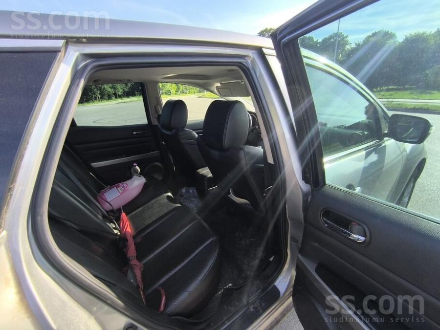 Grey Mazda CX-7 2010 in Riga, with an engine capacity of 2.20 L and mileage of 215 thousand km for 4500 €, photo 11 on AUTOMOTO.COM.LV