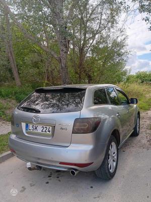 Pelēks Mazda CX-7 2010 Marijampole, ar dzinēja tilpumu 2.18 L un nobraukumu 236 tūkst. km par 3400 €, foto 3 vietnē AUTOMOTO.COM.LV