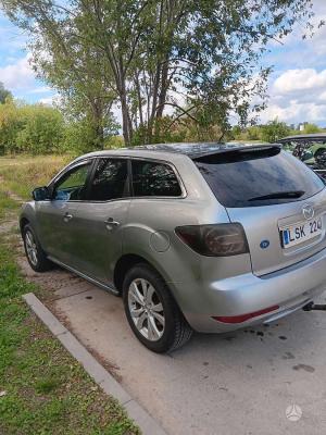 Pelēks Mazda CX-7 2010 Marijampole, ar dzinēja tilpumu 2.18 L un nobraukumu 236 tūkst. km par 3400 €, foto 5 vietnē AUTOMOTO.COM.LV