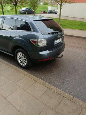 Grey Mazda CX-7 2011 in Vilnius, with an engine capacity of 2.18 L and mileage of 237 thousand km for 3800 €, photo 13 on AUTOMOTO.COM.LV