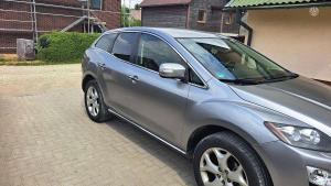 Grey Mazda CX-7 2011 in Plunge, with an engine capacity of 2.18 L and mileage of 265 thousand km for 3950 €, photo 5 on AUTOMOTO.COM.LV