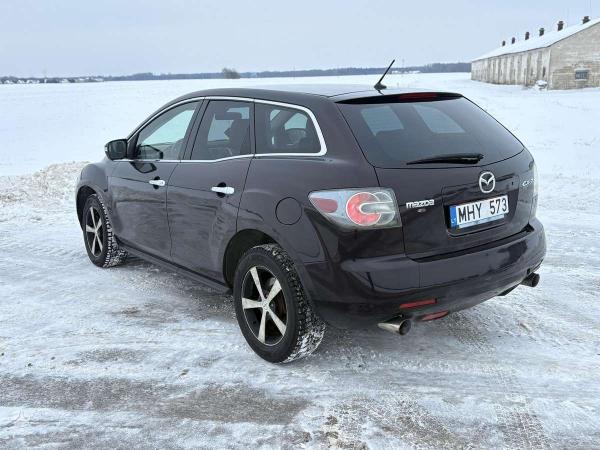 Red Mazda CX-7 2007 in Joniskis, with an engine capacity of 2.26 L and mileage of 199 thousand km for 1849 €, photo 3 on AUTOMOTO.COM.LV