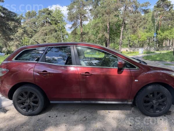 Красный Мазда СХ-7 2007 в Рига, объемом двигателя 2.30 л и пробегом 180 тыс. км за 2300 €, фото 1 на AUTOMOTO.COM.LV
