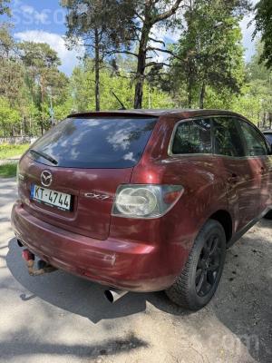 Sarkans Mazda CX-7 2007 Rīga, ar dzinēja tilpumu 2.30 L un nobraukumu 180 tūkst. km par 2300 €, foto 3 vietnē AUTOMOTO.COM.LV