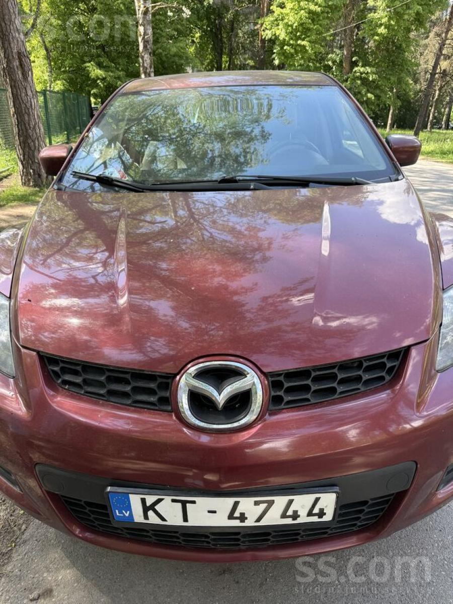 Sarkans Mazda CX-7 2007 Rīga, ar dzinēja tilpumu 2.30 L un nobraukumu 180 tūkst. km par 2300 €, foto 4 vietnē AUTOMOTO.COM.LV