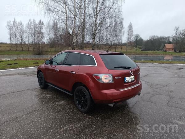 Красный Мазда СХ-7 2007 в Рига, объемом двигателя 2.30 л и пробегом 290 тыс. км за 1700 €, фото 2 на AUTOMOTO.COM.LV