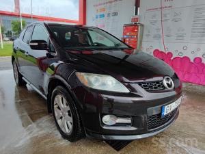Sarkans Mazda CX-7 2007 Rīga, ar dzinēja tilpumu 2.00 L un nobraukumu 0 tūkst. km par 2400 €, foto  vietnē AUTOMOTO.COM.LV
