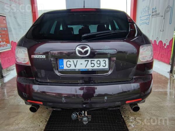 Red Mazda CX-7 2007 in Riga, with an engine capacity of 2.00 L and mileage of 0 thousand km for 2400 €, photo 5 on AUTOMOTO.COM.LV