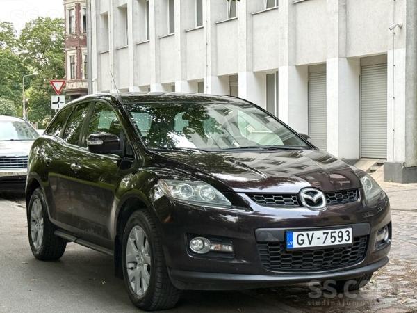 Red Mazda CX-7 2007 in Riga, with an engine capacity of 2.00 L and mileage of 304 thousand km for 2400 €, photo 2 on AUTOMOTO.COM.LV
