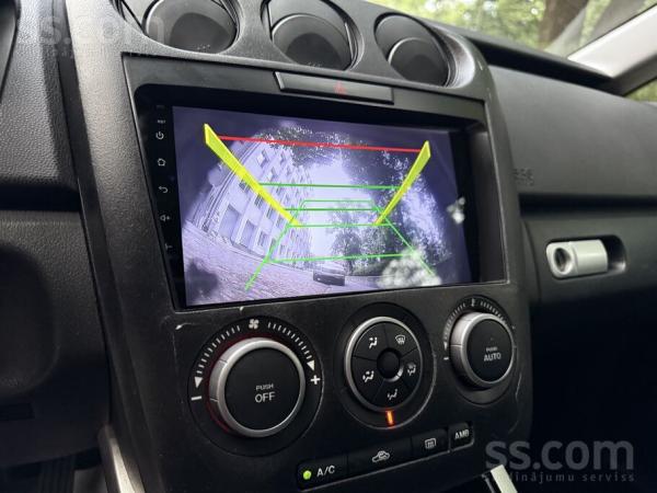 Red Mazda CX-7 2007 in Riga, with an engine capacity of 2.00 L and mileage of 304 thousand km for 2400 €, photo 8 on AUTOMOTO.COM.LV