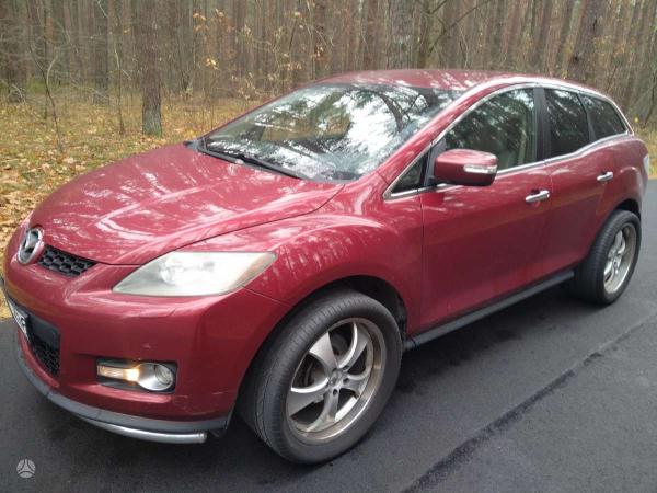 Red Mazda CX-7 2008 in Vilnius, with an engine capacity of 2.30 L and mileage of 202 thousand km for 1290 €, photo 1 on AUTOMOTO.COM.LV