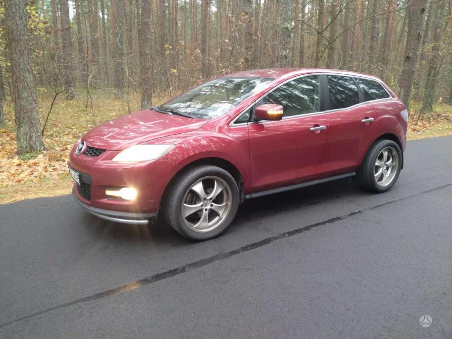 Sarkans Mazda CX-7 2008 Viļņa, ar dzinēja tilpumu 2.30 L un nobraukumu 202 tūkst. km par 1290 €, foto 23 vietnē AUTOMOTO.COM.LV