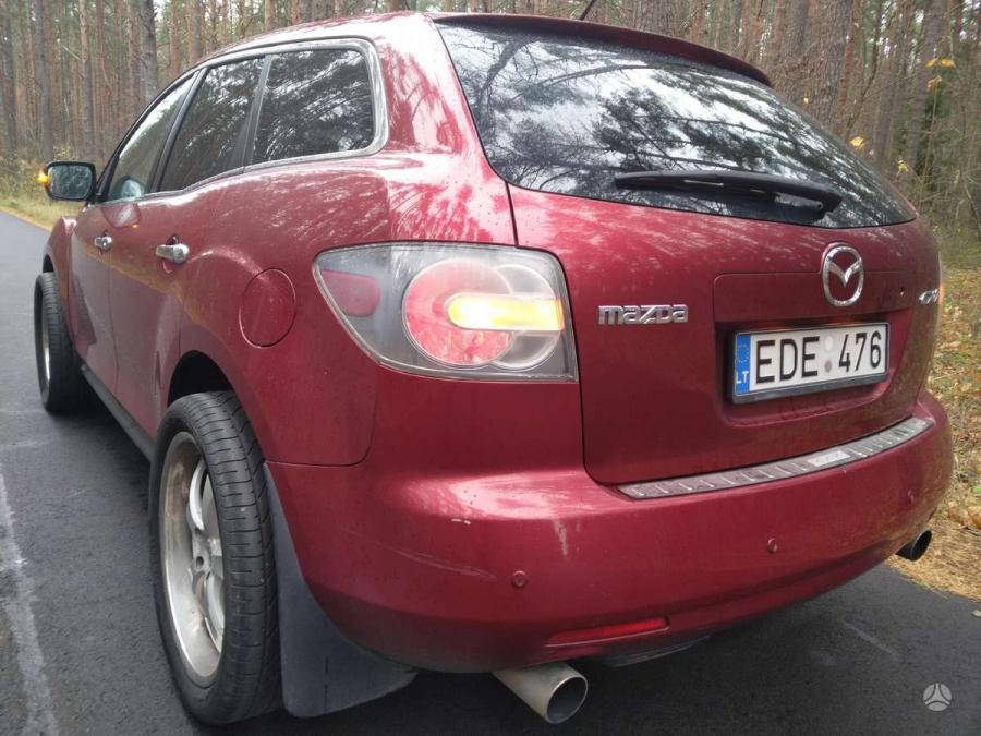 Sarkans Mazda CX-7 2008 Viļņa, ar dzinēja tilpumu 2.30 L un nobraukumu 202 tūkst. km par 1290 €, foto 25 vietnē AUTOMOTO.COM.LV