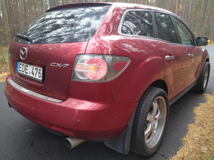 Sarkans Mazda CX-7 2008 Viļņa, ar dzinēja tilpumu 2.30 L un nobraukumu 202 tūkst. km par 1290 €, foto 27 vietnē AUTOMOTO.COM.LV