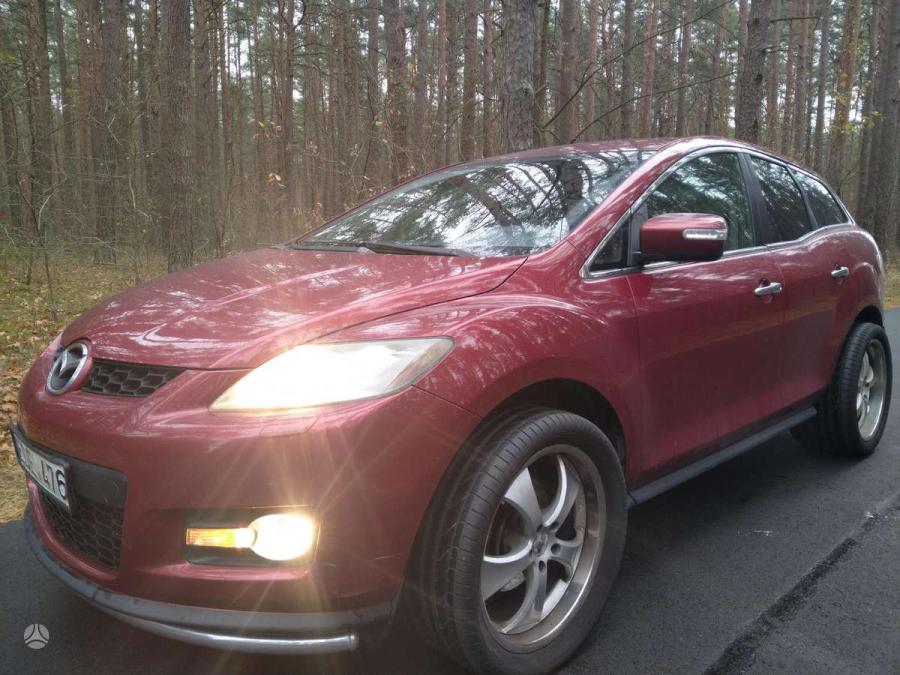 Sarkans Mazda CX-7 2008 Viļņa, ar dzinēja tilpumu 2.30 L un nobraukumu 202 tūkst. km par 1290 €, foto 33 vietnē AUTOMOTO.COM.LV