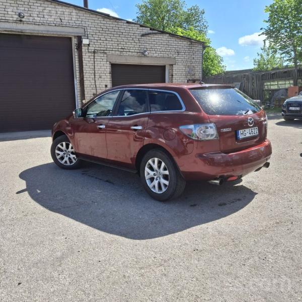 Red Mazda CX-7 2008 in Talsi, with an engine capacity of 2.30 L and mileage of 270 thousand km for 2700 €, photo 2 on AUTOMOTO.COM.LV