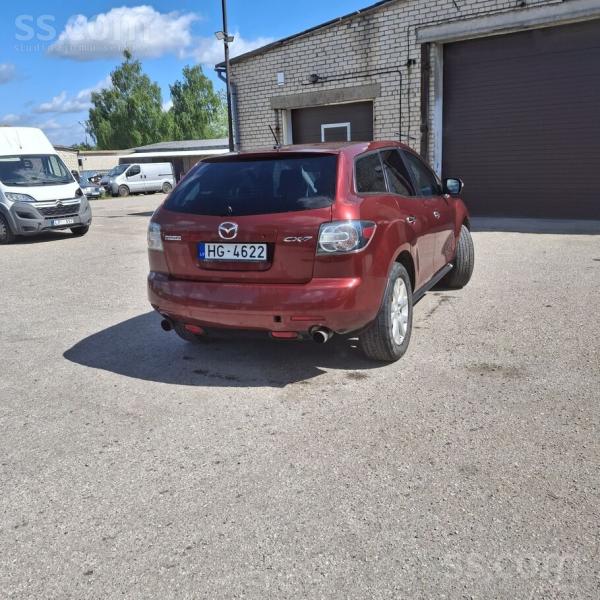 Red Mazda CX-7 2008 in Talsi, with an engine capacity of 2.30 L and mileage of 270 thousand km for 2700 €, photo 3 on AUTOMOTO.COM.LV