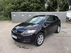 Red Mazda CX-7 2008 in Siauliai, with an engine capacity of 2.26 L and mileage of 143 thousand km for 1800 €, photo  on AUTOMOTO.COM.LV