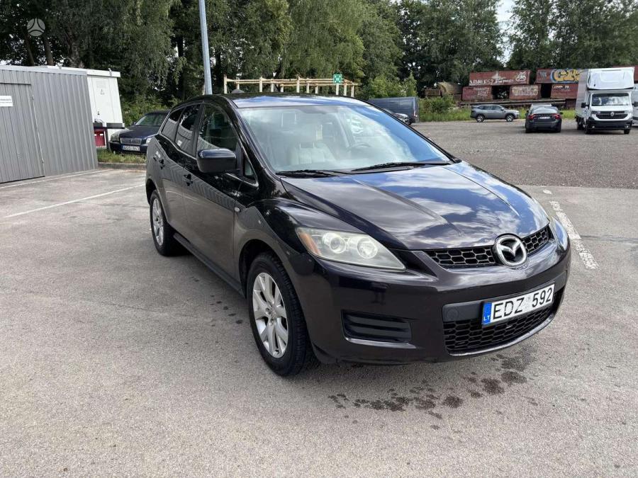 Red Mazda CX-7 2008 in Siauliai, with an engine capacity of 2.26 L and mileage of 143 thousand km for 1800 €, photo 3 on AUTOMOTO.COM.LV