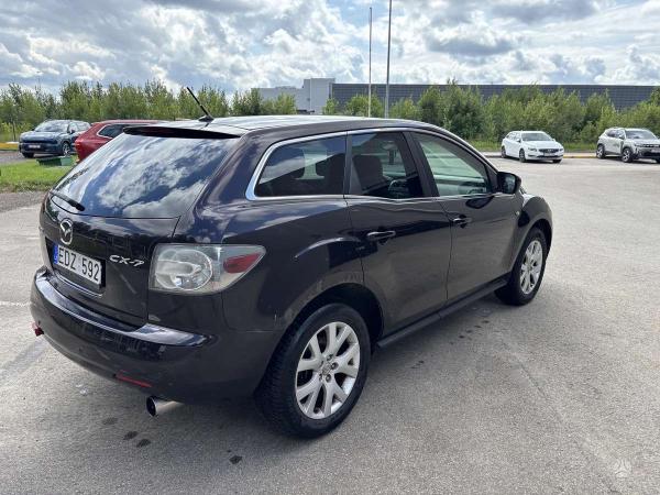 Red Mazda CX-7 2008 in Siauliai, with an engine capacity of 2.26 L and mileage of 143 thousand km for 1800 €, photo 3 on AUTOMOTO.COM.LV