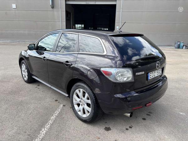 Red Mazda CX-7 2008 in Siauliai, with an engine capacity of 2.26 L and mileage of 143 thousand km for 1800 €, photo 4 on AUTOMOTO.COM.LV