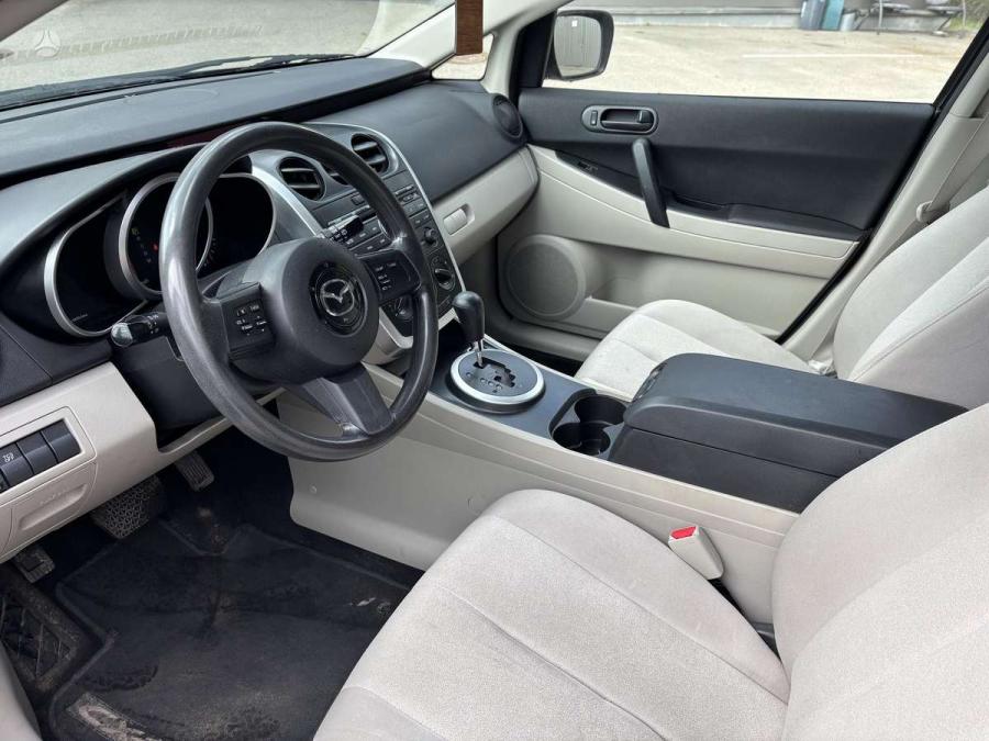 Red Mazda CX-7 2008 in Siauliai, with an engine capacity of 2.26 L and mileage of 143 thousand km for 1800 €, photo 6 on AUTOMOTO.COM.LV