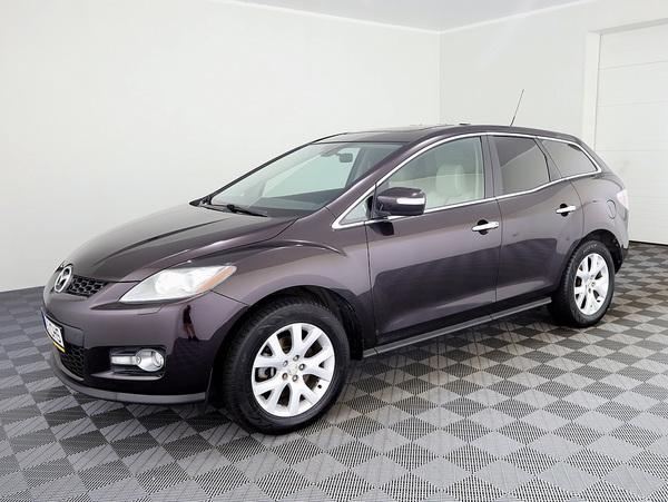 Red Mazda CX-7 2008 in Tallinn, with an engine capacity of 2.30 L and mileage of 179 thousand km for 2499 €, photo 2 on AUTOMOTO.COM.LV