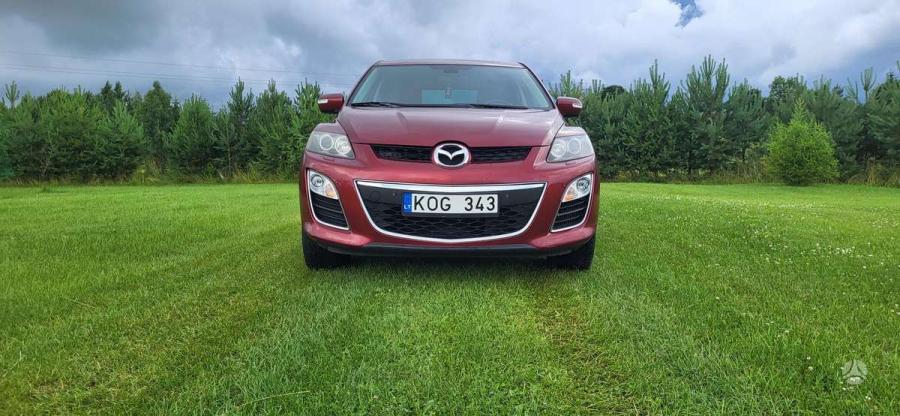 Red Mazda CX-7 2009 in Vilnius, with an engine capacity of 2.18 L and mileage of 303 thousand km for 3400 €, photo 1 on AUTOMOTO.COM.LV
