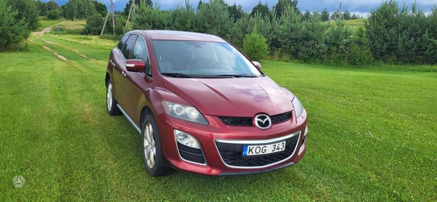 Red Mazda CX-7 2009 in Vilnius, with an engine capacity of 2.18 L and mileage of 303 thousand km for 3400 €, photo 8 on AUTOMOTO.COM.LV