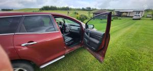 Red Mazda CX-7 2009 in Vilnius, with an engine capacity of 2.18 L and mileage of 303 thousand km for 3400 €, photo 9 on AUTOMOTO.COM.LV