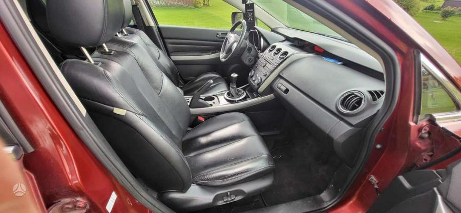 Red Mazda CX-7 2009 in Vilnius, with an engine capacity of 2.18 L and mileage of 303 thousand km for 3400 €, photo 10 on AUTOMOTO.COM.LV