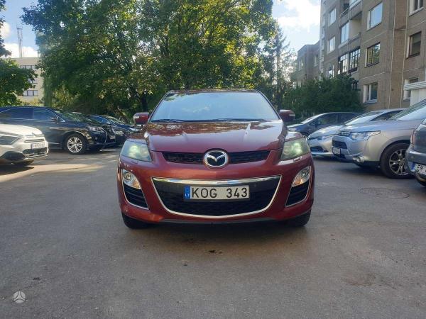 Red Mazda CX-7 2009 in Vilnius, with an engine capacity of 2.18 L and mileage of 303 thousand km for 1800 €, photo 4 on AUTOMOTO.COM.LV