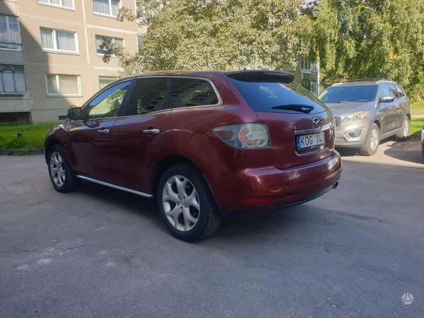Red Mazda CX-7 2009 in Vilnius, with an engine capacity of 2.18 L and mileage of 303 thousand km for 1800 €, photo 10 on AUTOMOTO.COM.LV