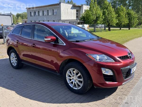 Red Mazda CX-7 2010 in Limbazi, with an engine capacity of 2.20 L and mileage of 210 thousand km for 4500 €, photo 3 on AUTOMOTO.COM.LV