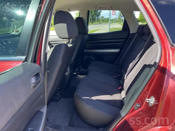 Red Mazda CX-7 2010 in Limbazi, with an engine capacity of 2.20 L and mileage of 210 thousand km for 4500 €, photo 9 on AUTOMOTO.COM.LV
