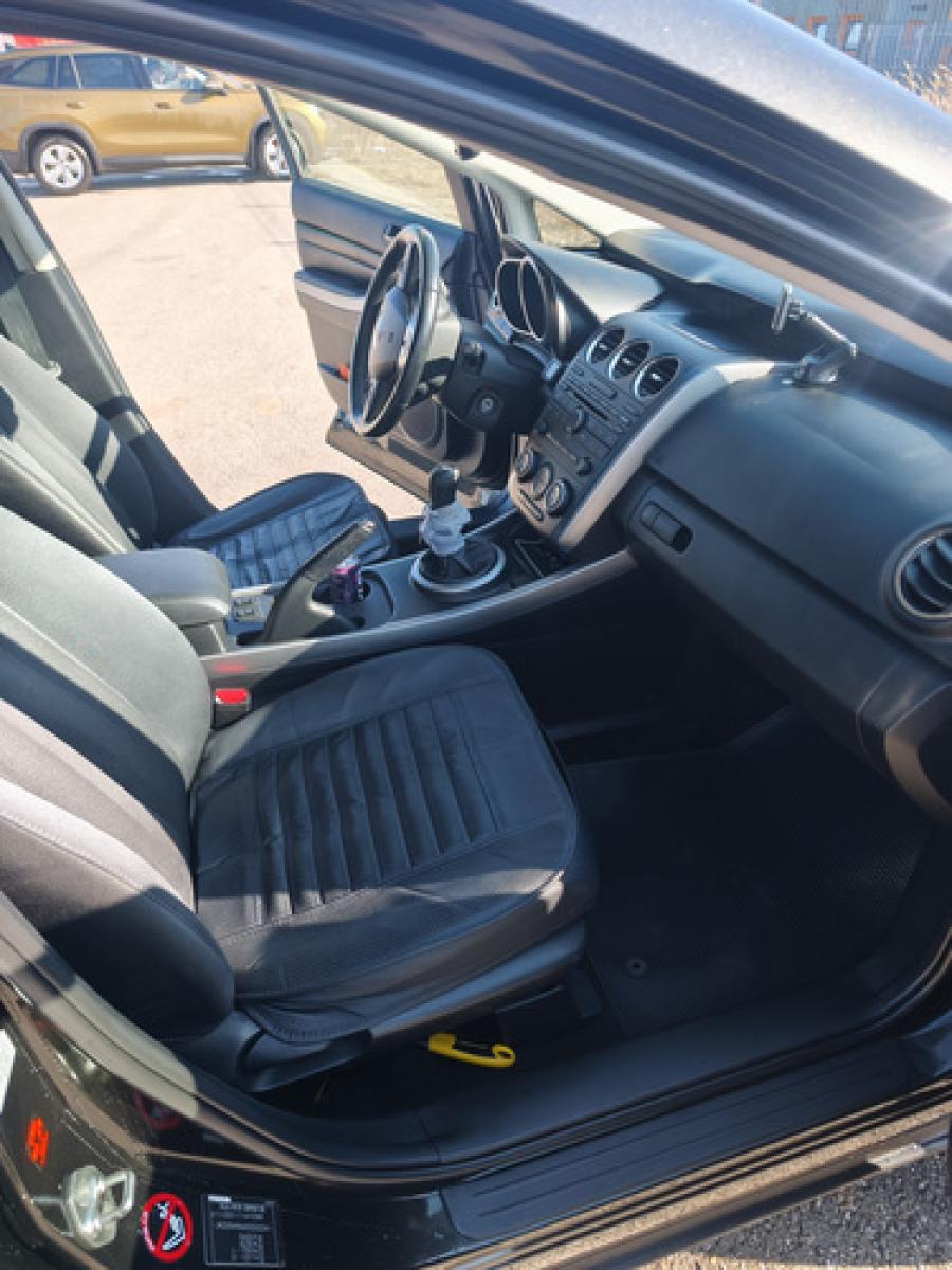 Mazda CX-7 2010 Tartu, ar dzinēja tilpumu 2.20 L un nobraukumu 204 tūkst. km par 4800 €, foto 15 vietnē AUTOMOTO.COM.LV