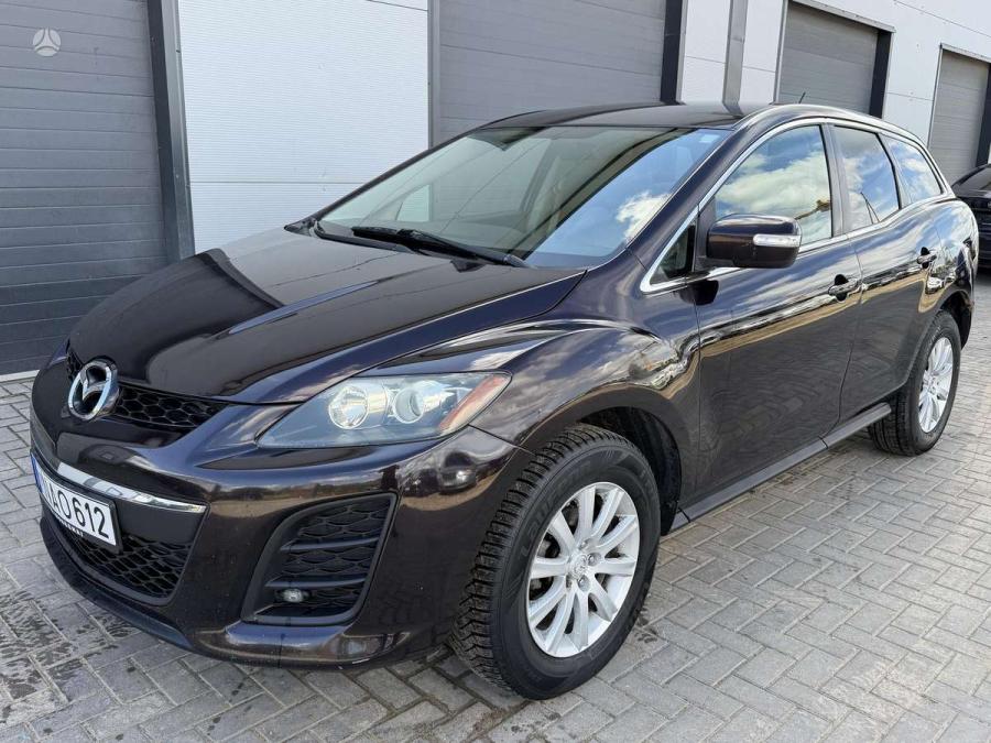 Violet Mazda CX-7 2010 in Vilnius, with an engine capacity of 2.50 L and mileage of 225 thousand km for 2850 €, photo 1 on AUTOMOTO.COM.LV