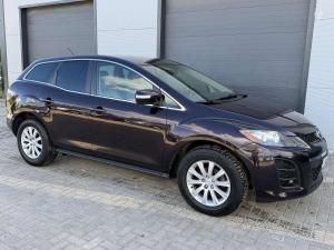 Violet Mazda CX-7 2010 in Vilnius, with an engine capacity of 2.50 L and mileage of 225 thousand km for 2850 €, photo 3 on AUTOMOTO.COM.LV