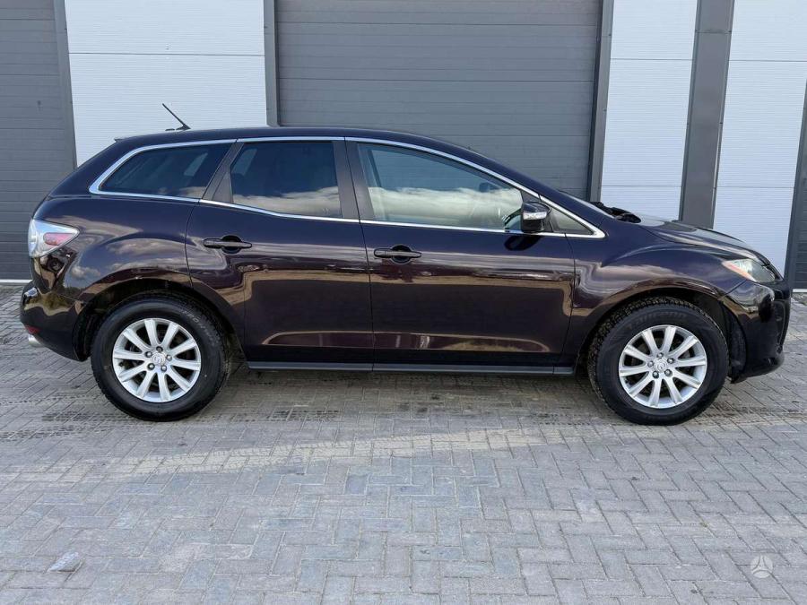 Violet Mazda CX-7 2010 in Vilnius, with an engine capacity of 2.50 L and mileage of 225 thousand km for 2850 €, photo 5 on AUTOMOTO.COM.LV